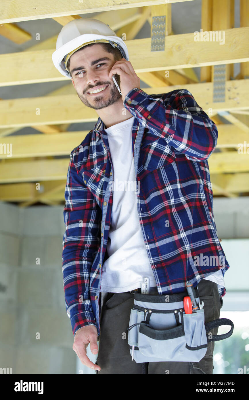 male construction worker builder on cell phone Stock Photo - Alamy