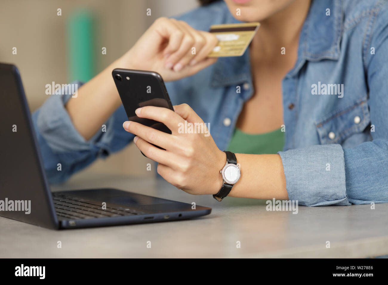 Hand woman uses credit hi-res stock photography and images - Alamy