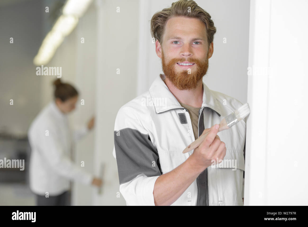 Man painting door frame hi-res stock photography and images - Alamy