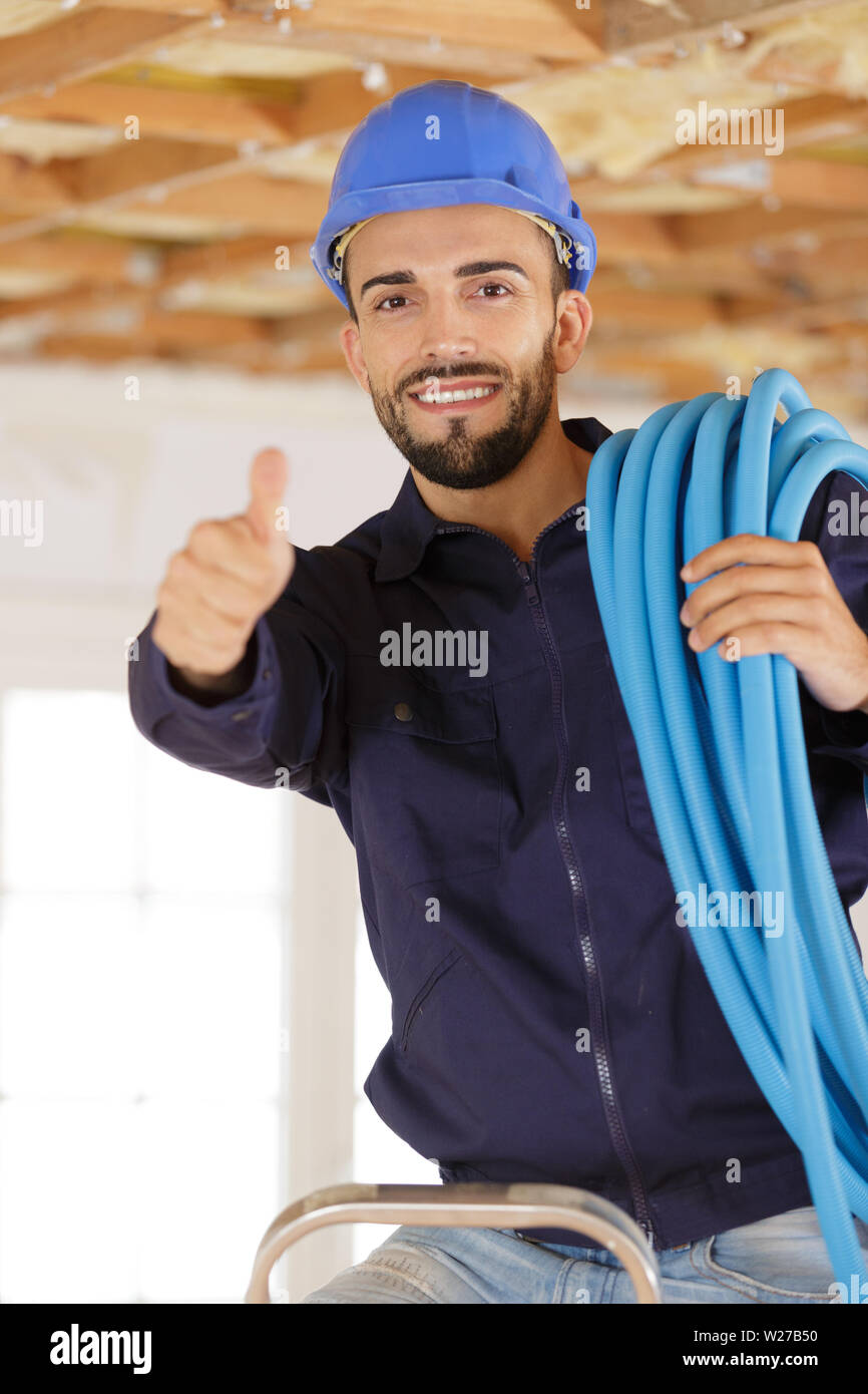 an engineer with thumbs up Stock Photo - Alamy