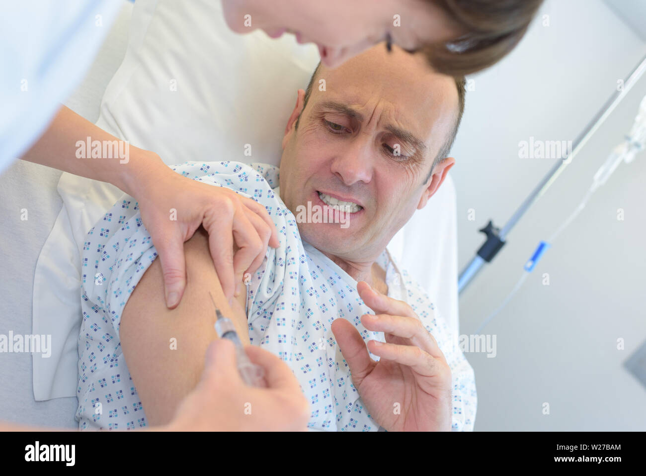 man scared of injection Stock Photo - Alamy