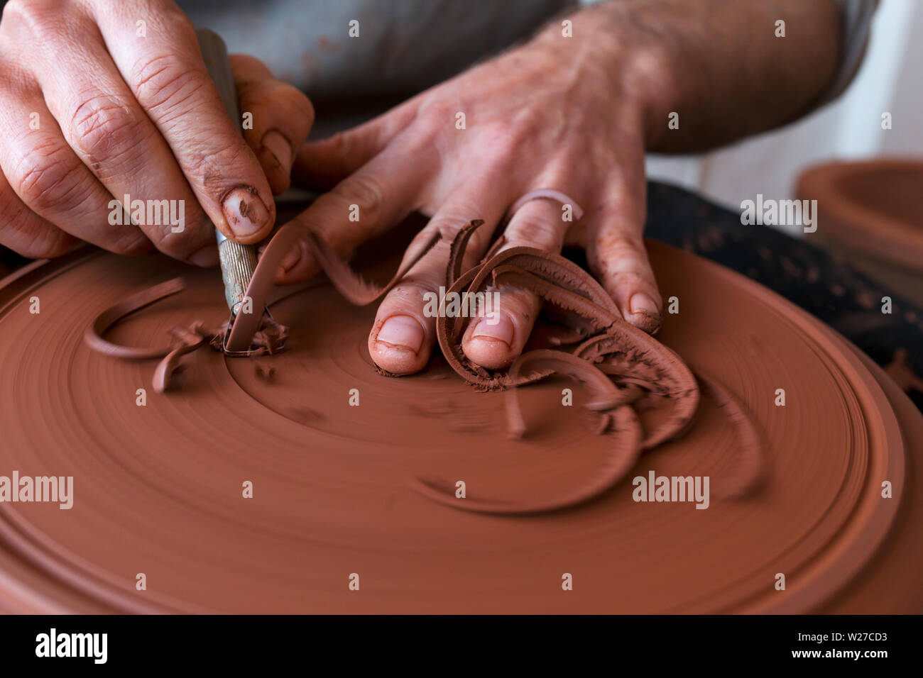 Professional potter making bowl in pottery workshop, studio Stock Photo ...
