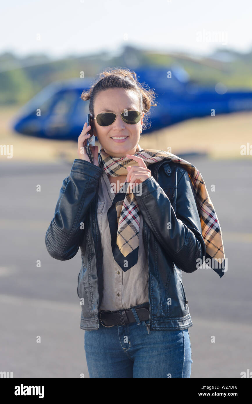 woman helicopter telephone Stock Photo - Alamy