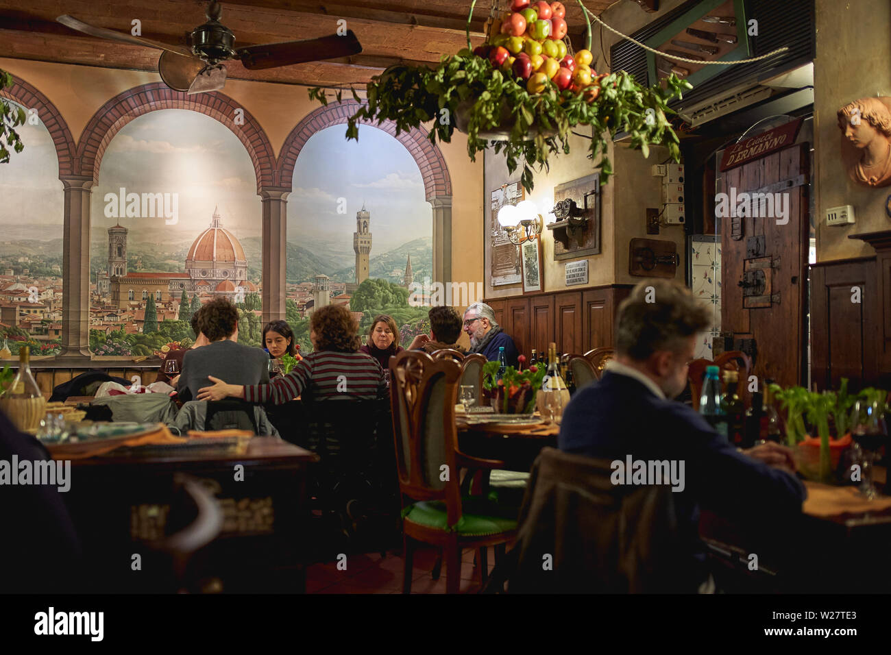 Florence, Italy - January, 2019. Interior of a typical small restaurant ...