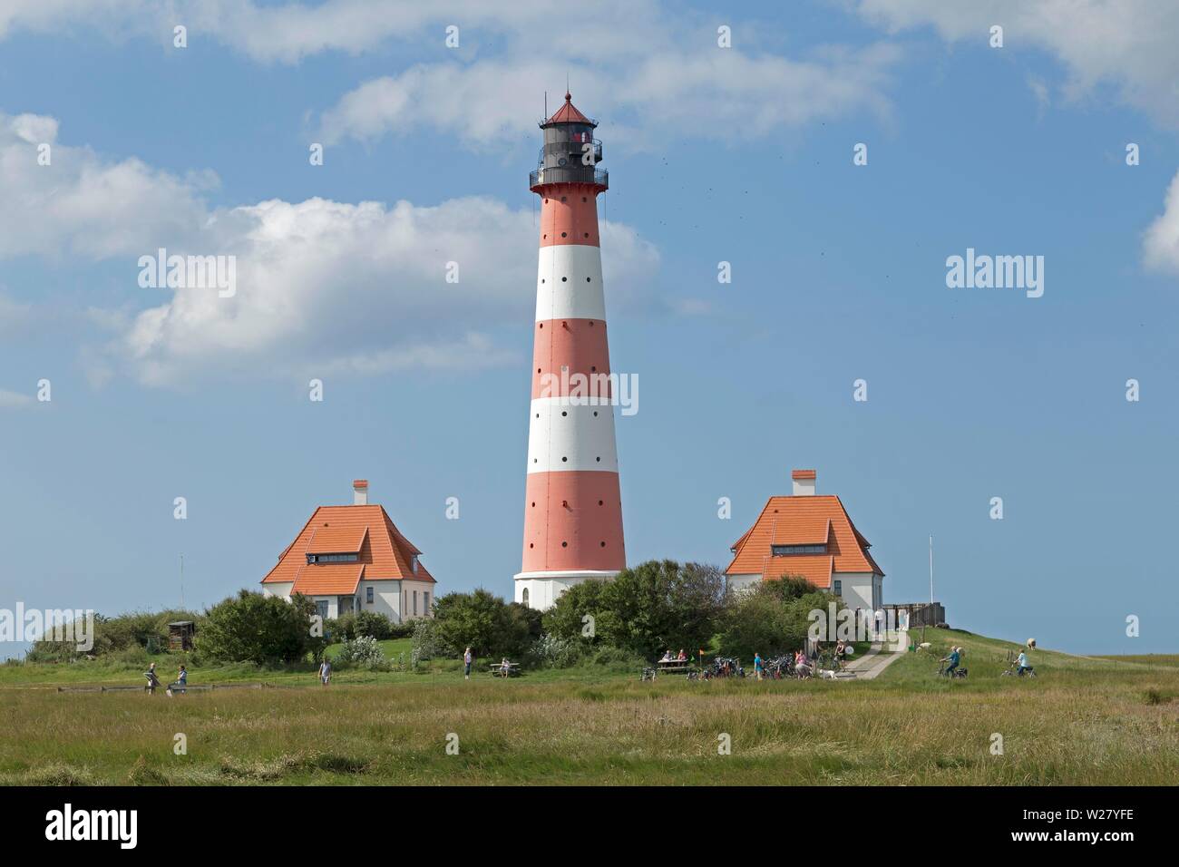 Westerhever lighthouse with cloud sky hi-res stock photography and ...