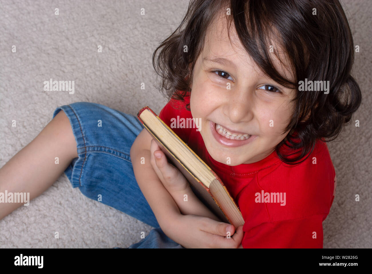 Boy with dictionary hi-res stock photography and images - Alamy