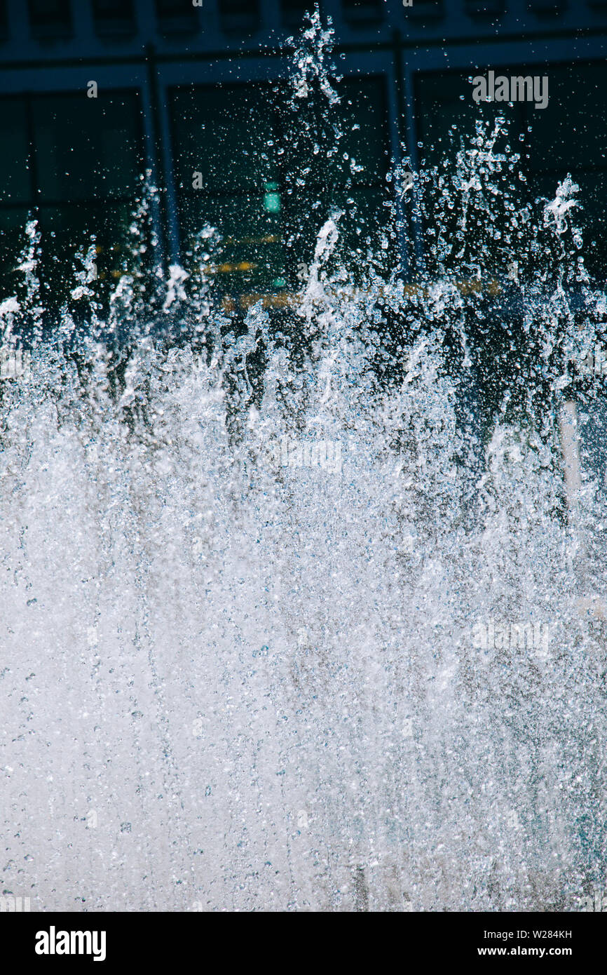A water fountain sprinkling water in the view Stock Photo - Alamy