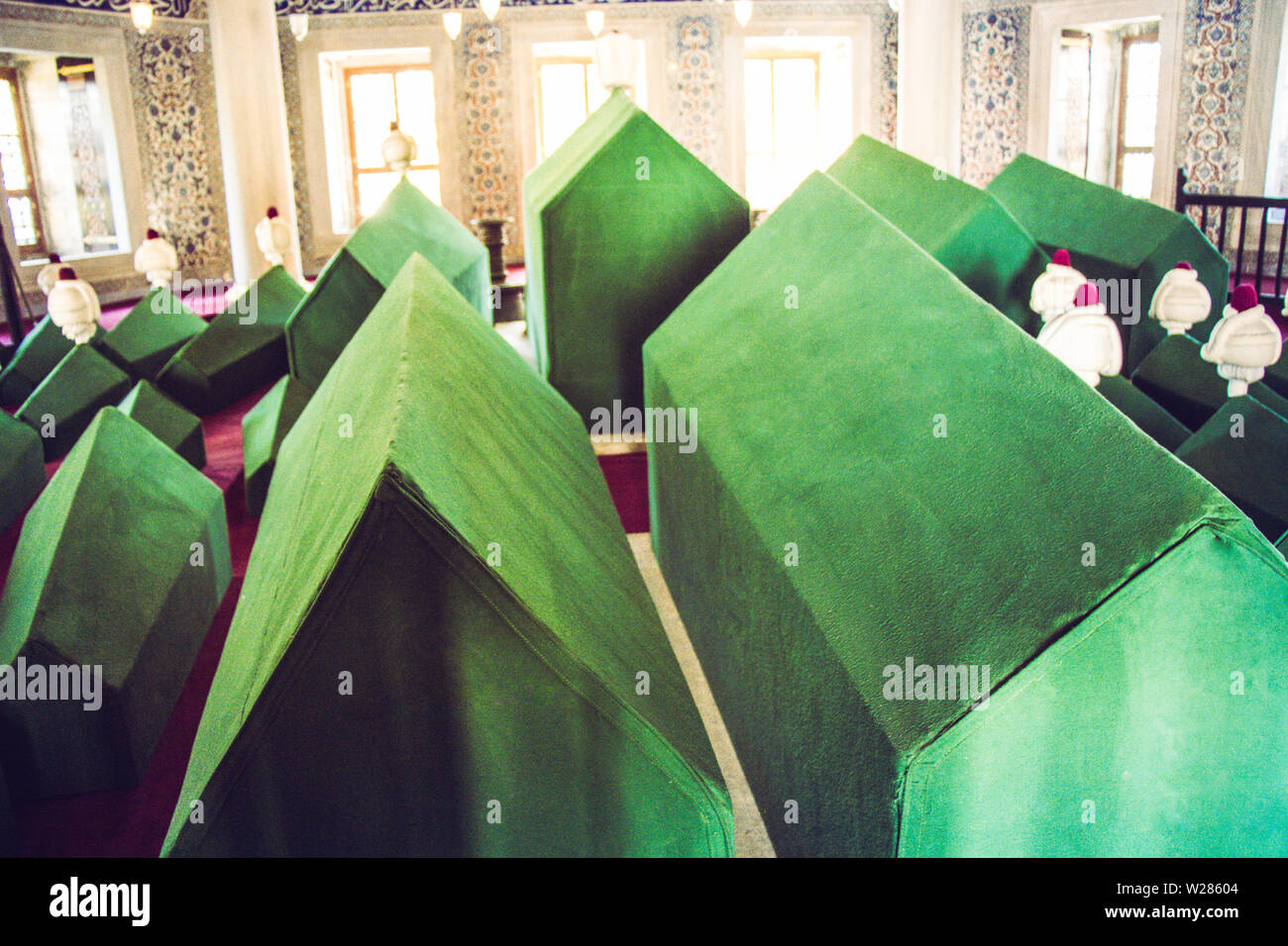 Rows of coffins in an ottoman turkish mausoleum tomb Stock Photo - Alamy