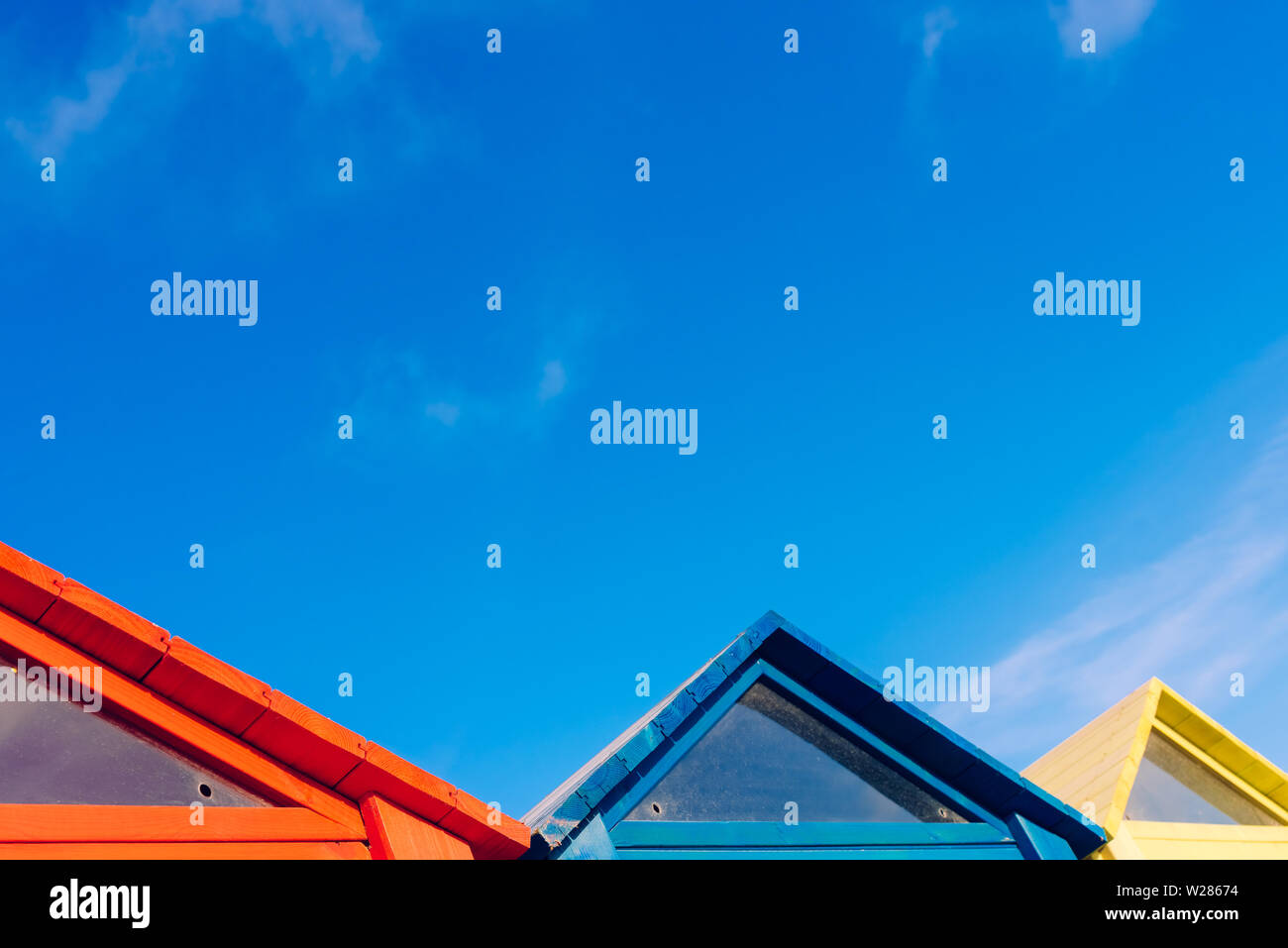 Design of colorful wooden triangular boards with blue sky background ...