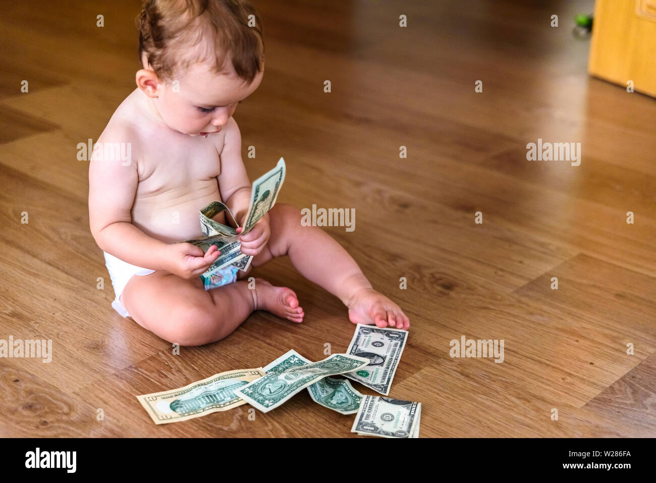 Kid Dollar High Resolution Stock Photography and Images - Alamy
