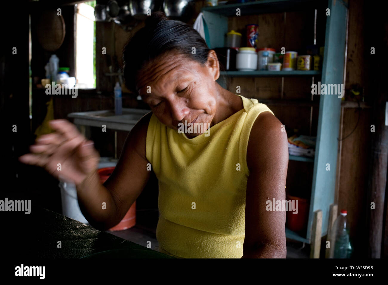 Seating woman, Cuieiras River, Amazônia, Manaus, Amazonas, Brazil Stock ...