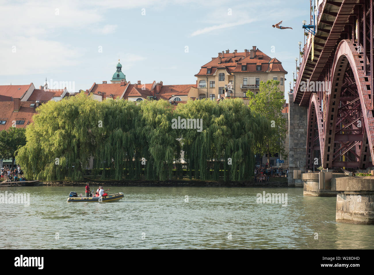 A contestant performs a dive from the Old Bridge during 19th annual ...