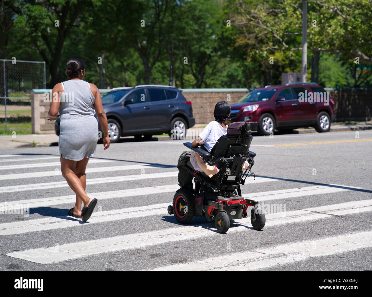 Child power wheelchair race hi-res stock photography and images - Alamy