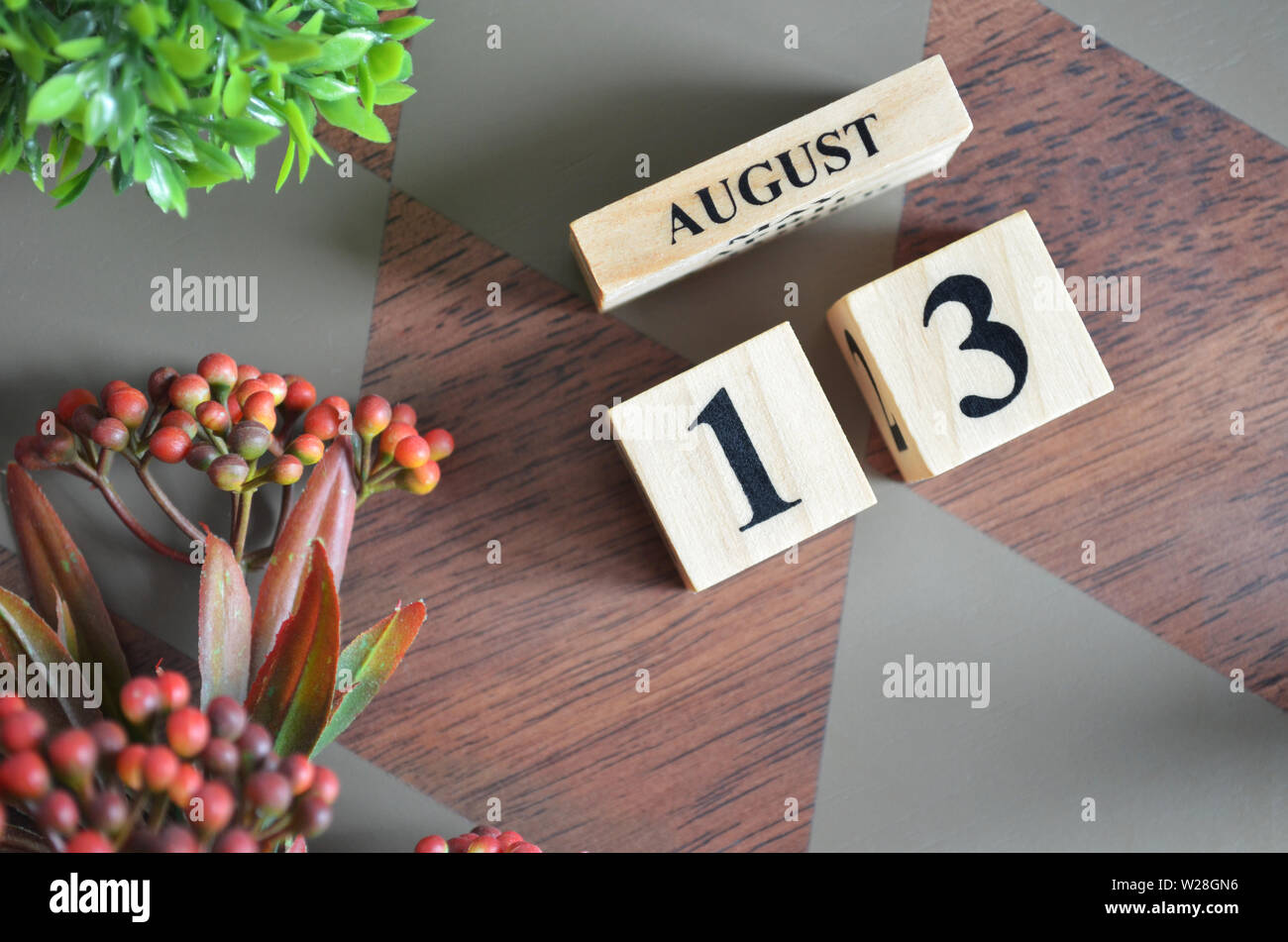 Date of August month. Diamond wood table for background Stock Photo - Alamy