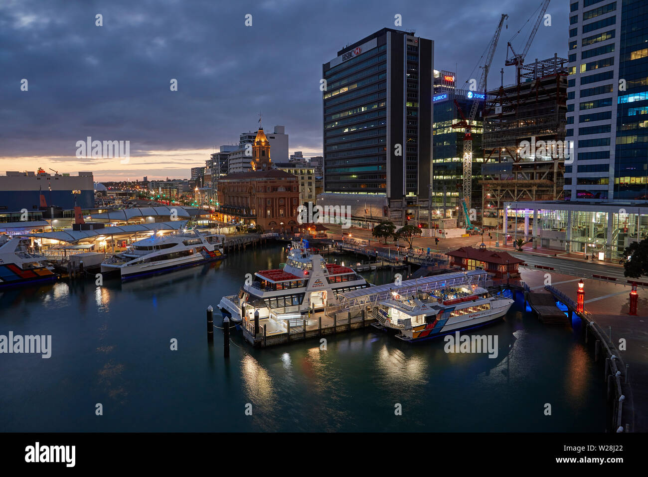 Auckland Ferry Terminal, and historic Ferry Building at night, Auckland ...