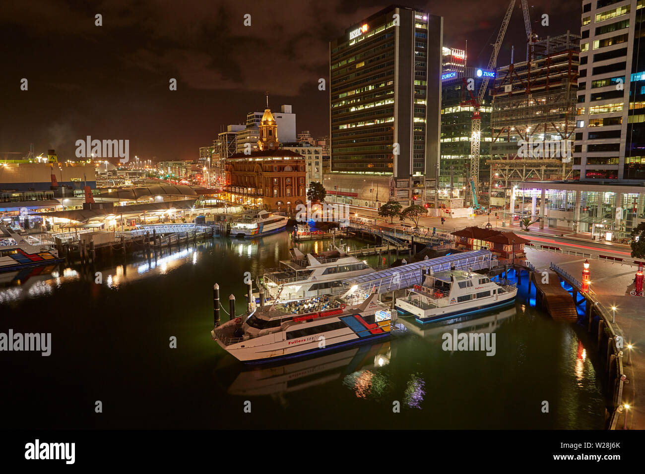 Auckland Ferry Terminal, and historic Ferry Building at night, Auckland ...