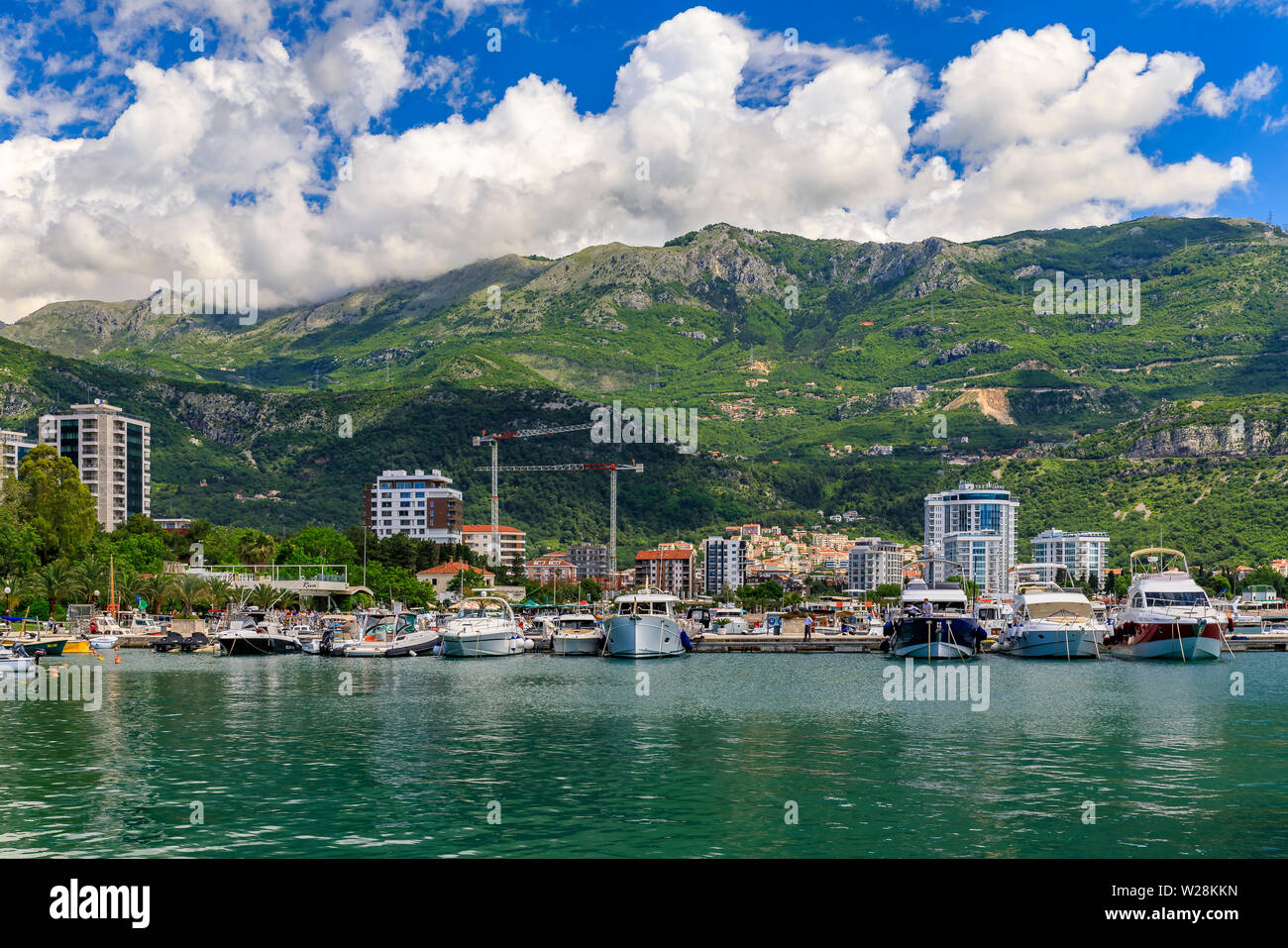Budva, Montenegro - May 30, 2019: Anchored boats in the port and marina ...