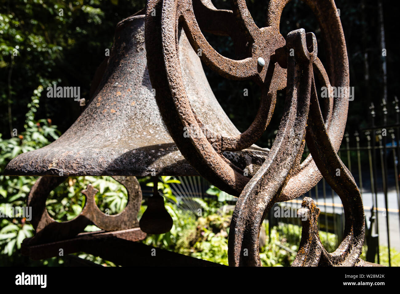 A rusted iron dinner bell Stock Photo - Alamy