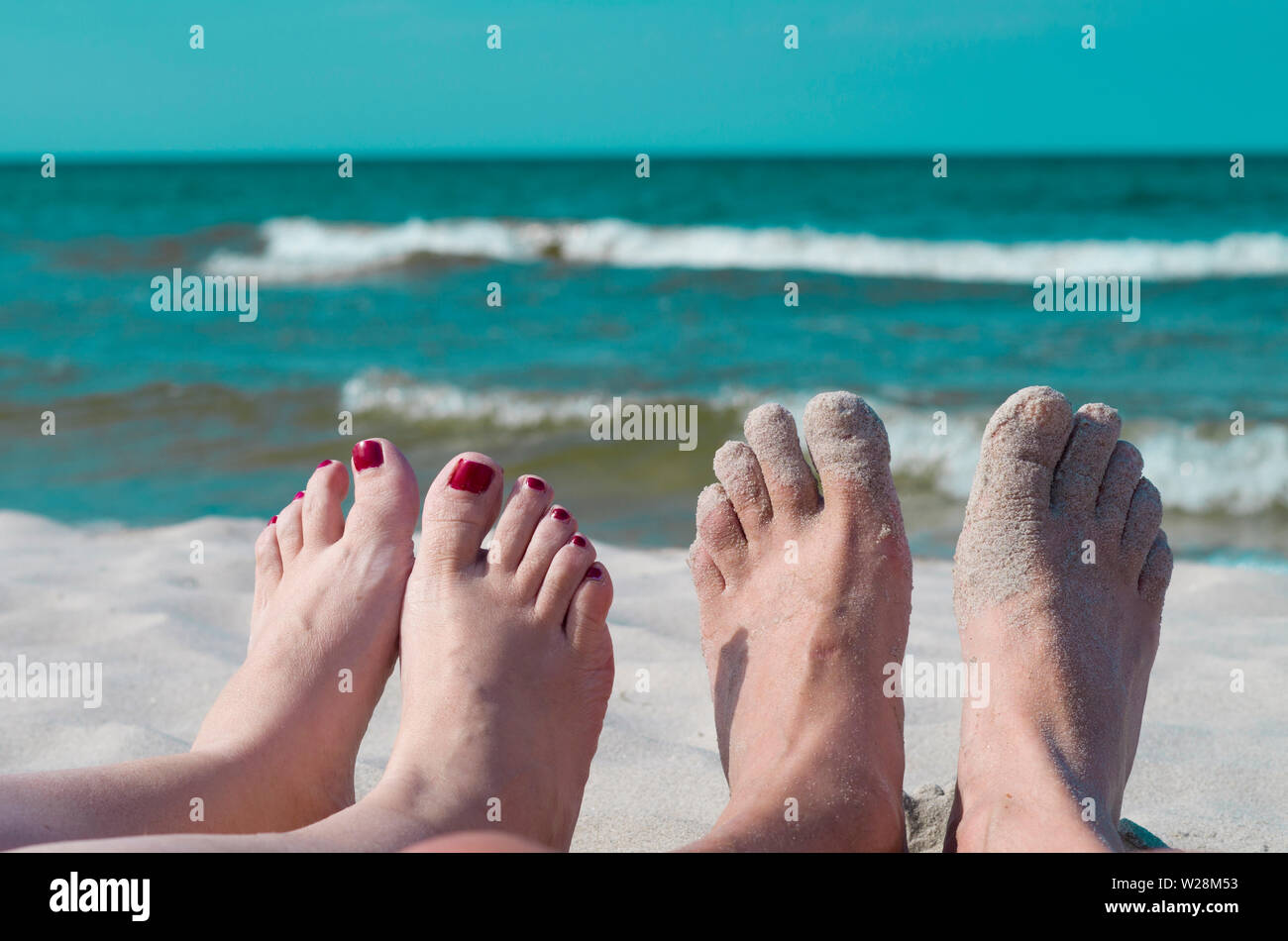 Feet in front of the sea Stock Photo - Alamy