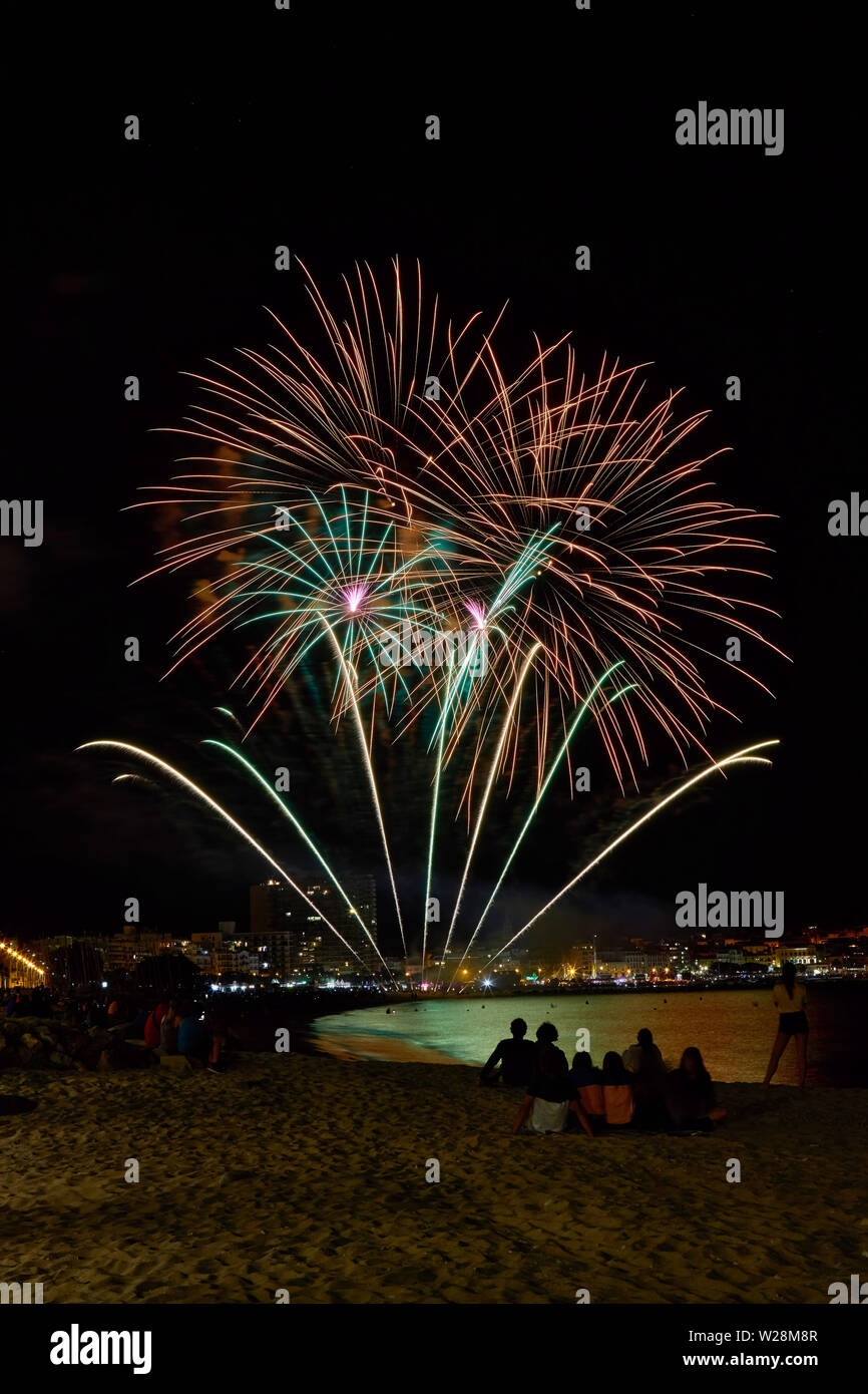 Beautiful firework in a small Spanish town Palamos, day of celebrating ...