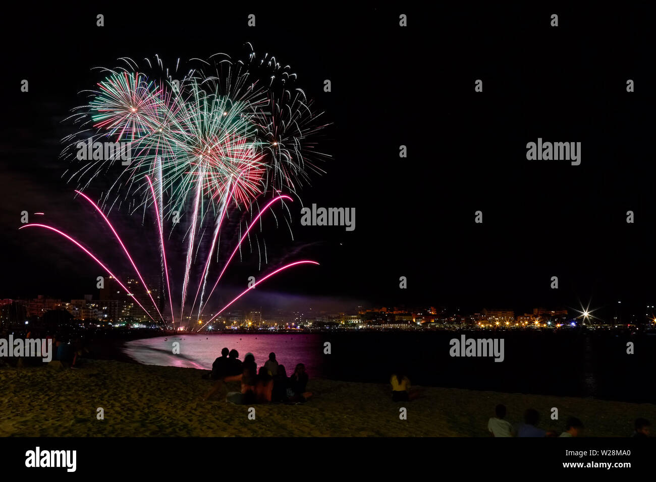 Beautiful firework in a small Spanish town Palamos, day of celebrating ...
