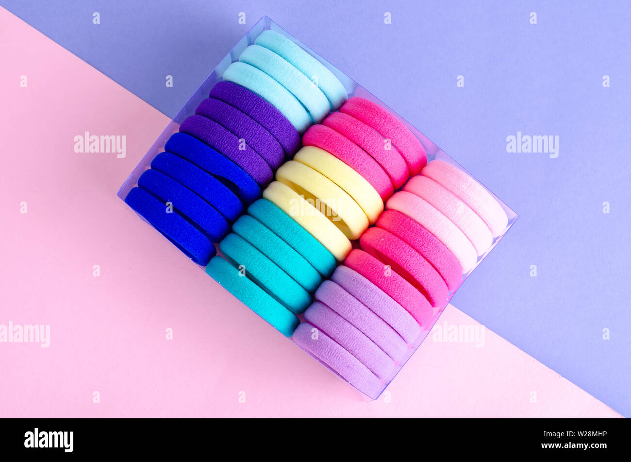 Colored hair ties on bright background. Photo Stock Photo - Alamy