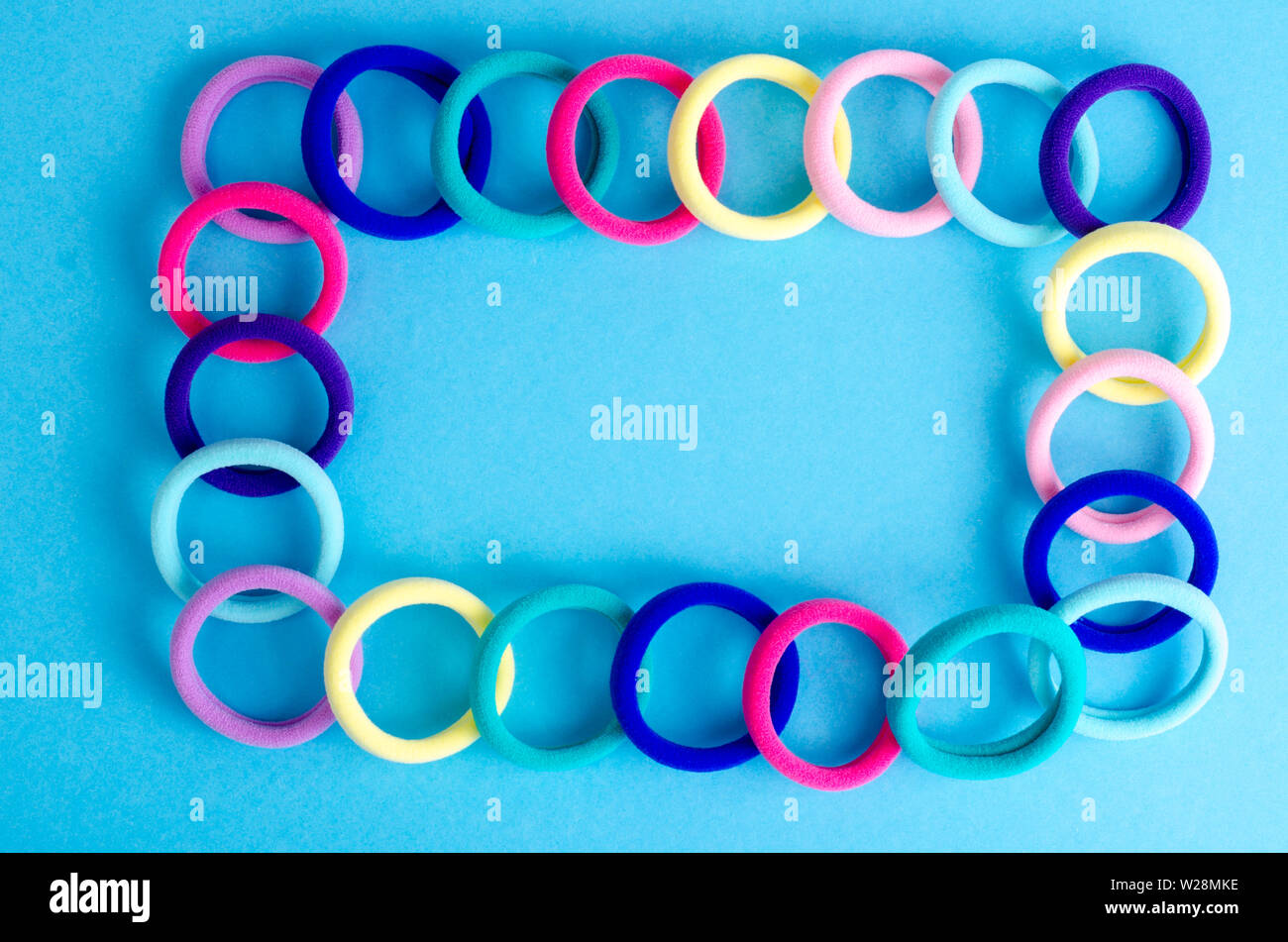Colored hair ties on bright background. Photo Stock Photo - Alamy