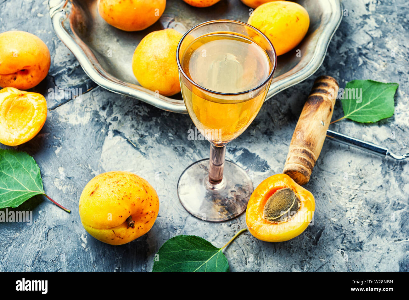 Homemade ripe apricot wine.Alcoholic drink.Fruit wine or liquor in ...