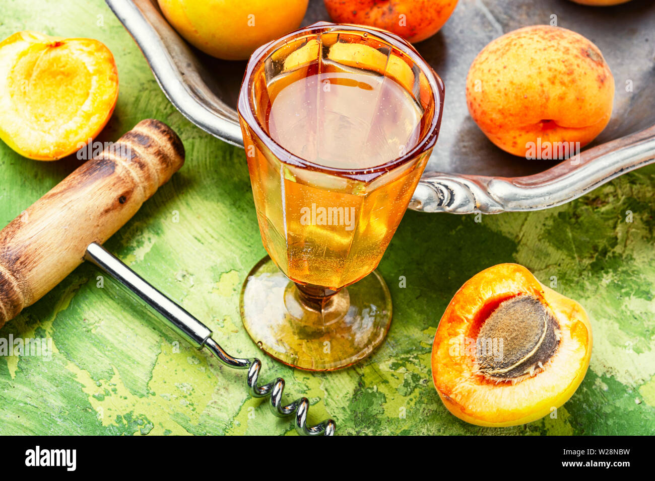 Homemade ripe apricot wine.Alcoholic drink.Fruit wine or liquor in ...