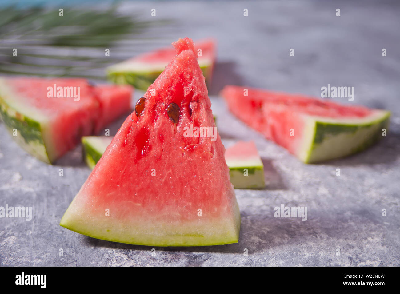 Fresh ripe sliced watermelon on the gray background Stock Photo - Alamy