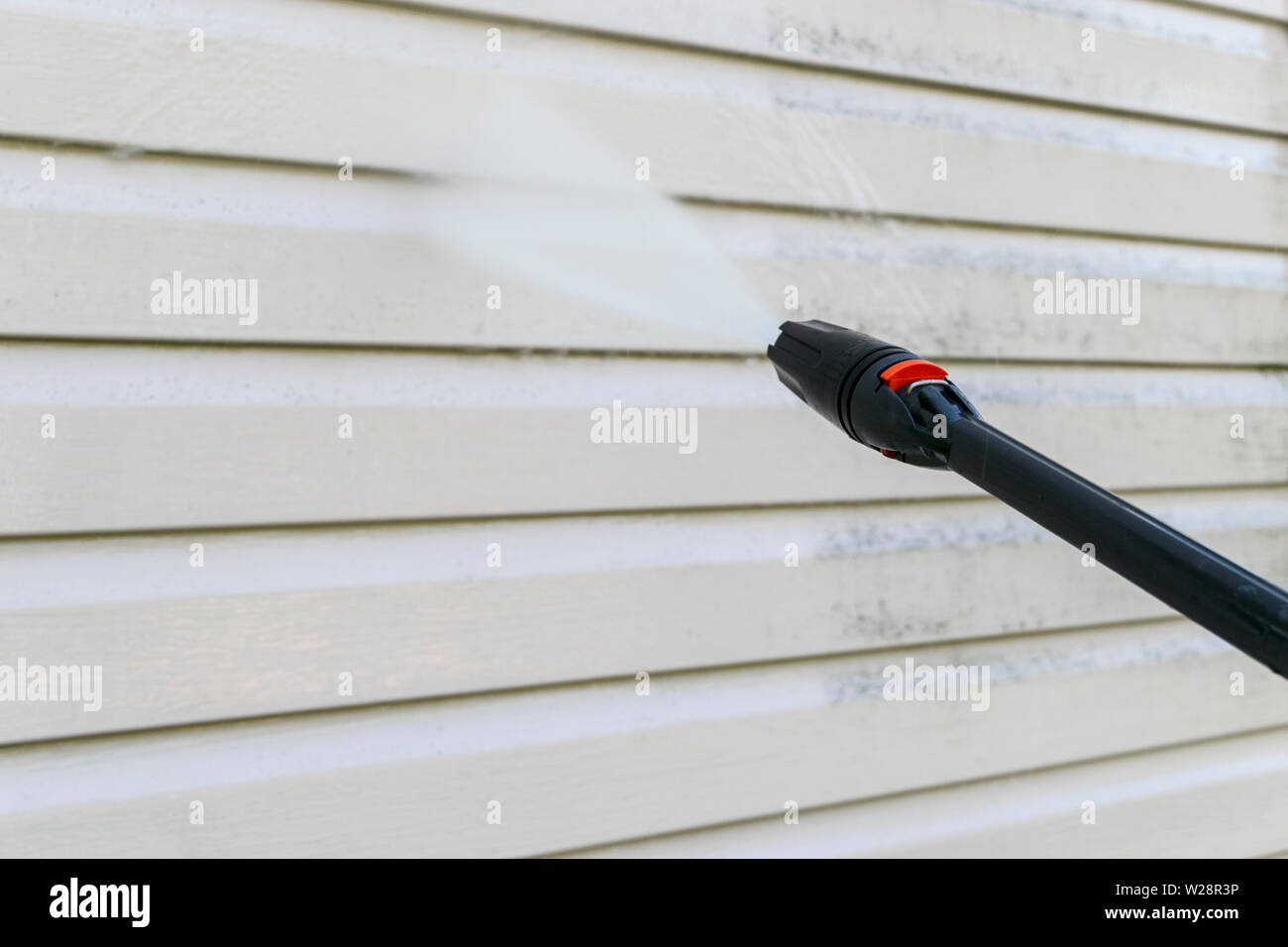 Cleaning service washing building facade with pressure water. Cleaning ...