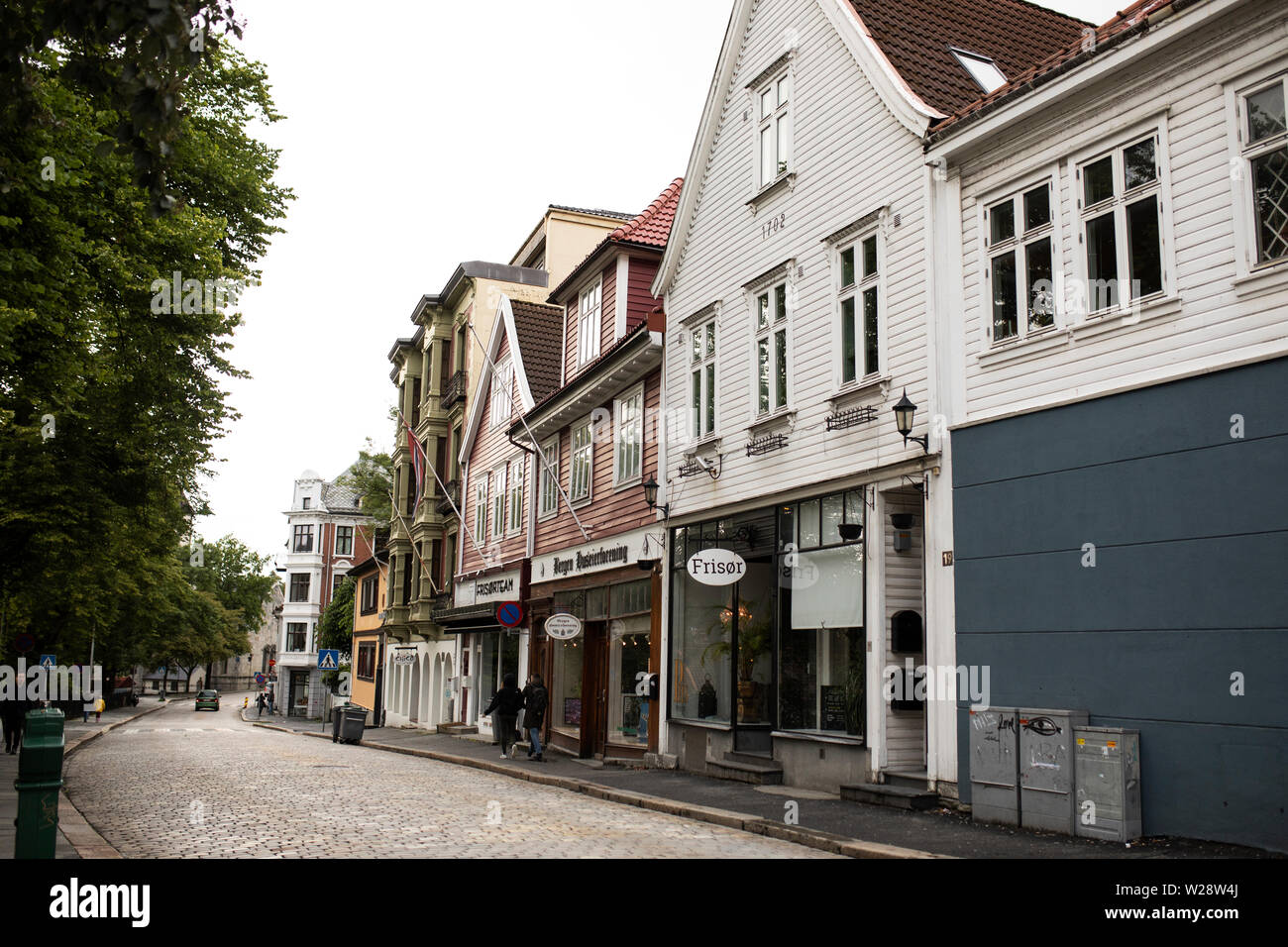 Shops and restaurants on the street Øvregaten in the Bryggen ...