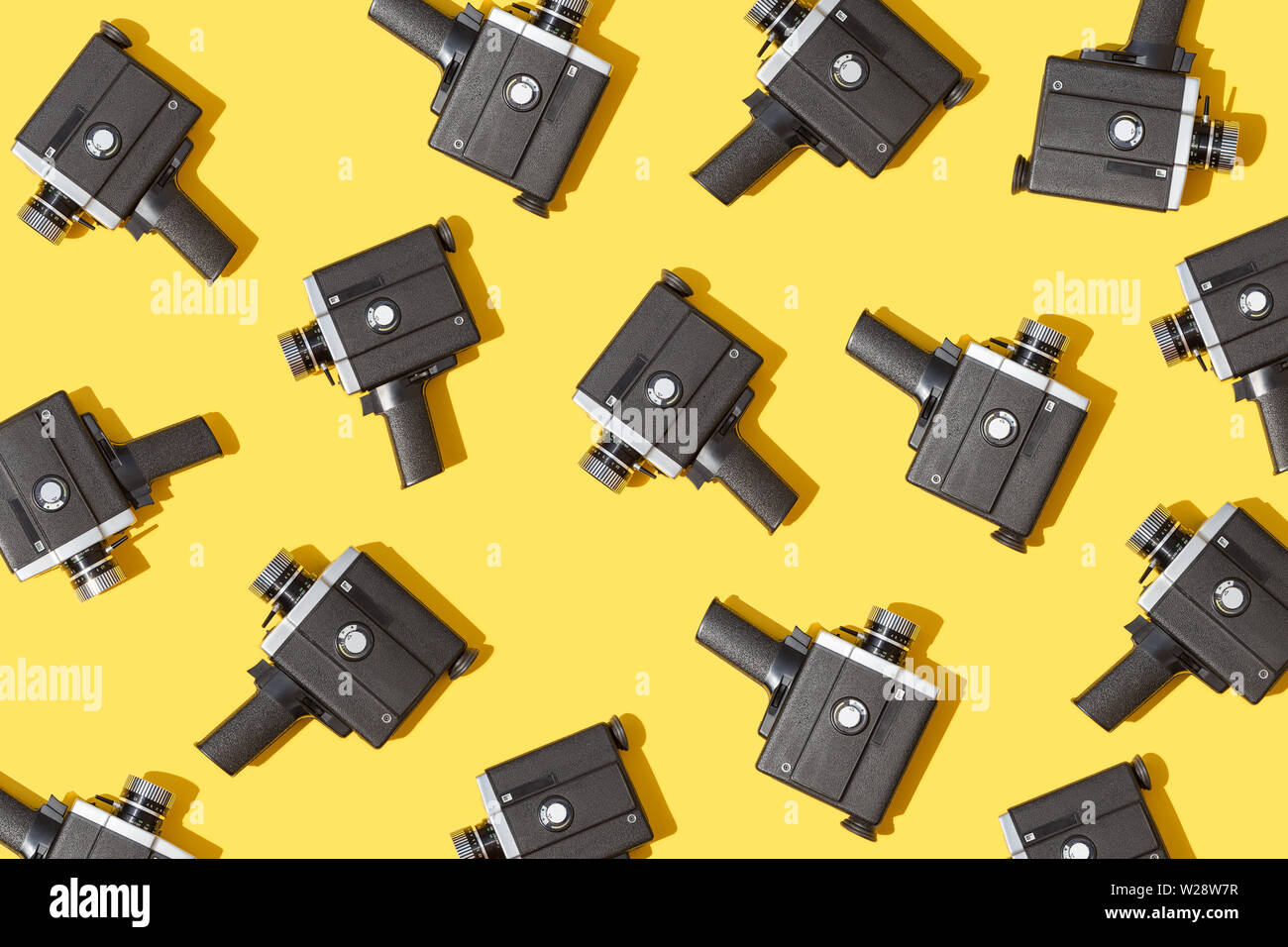 Vintage movie cameras - seamless pattern on yellow background Stock ...