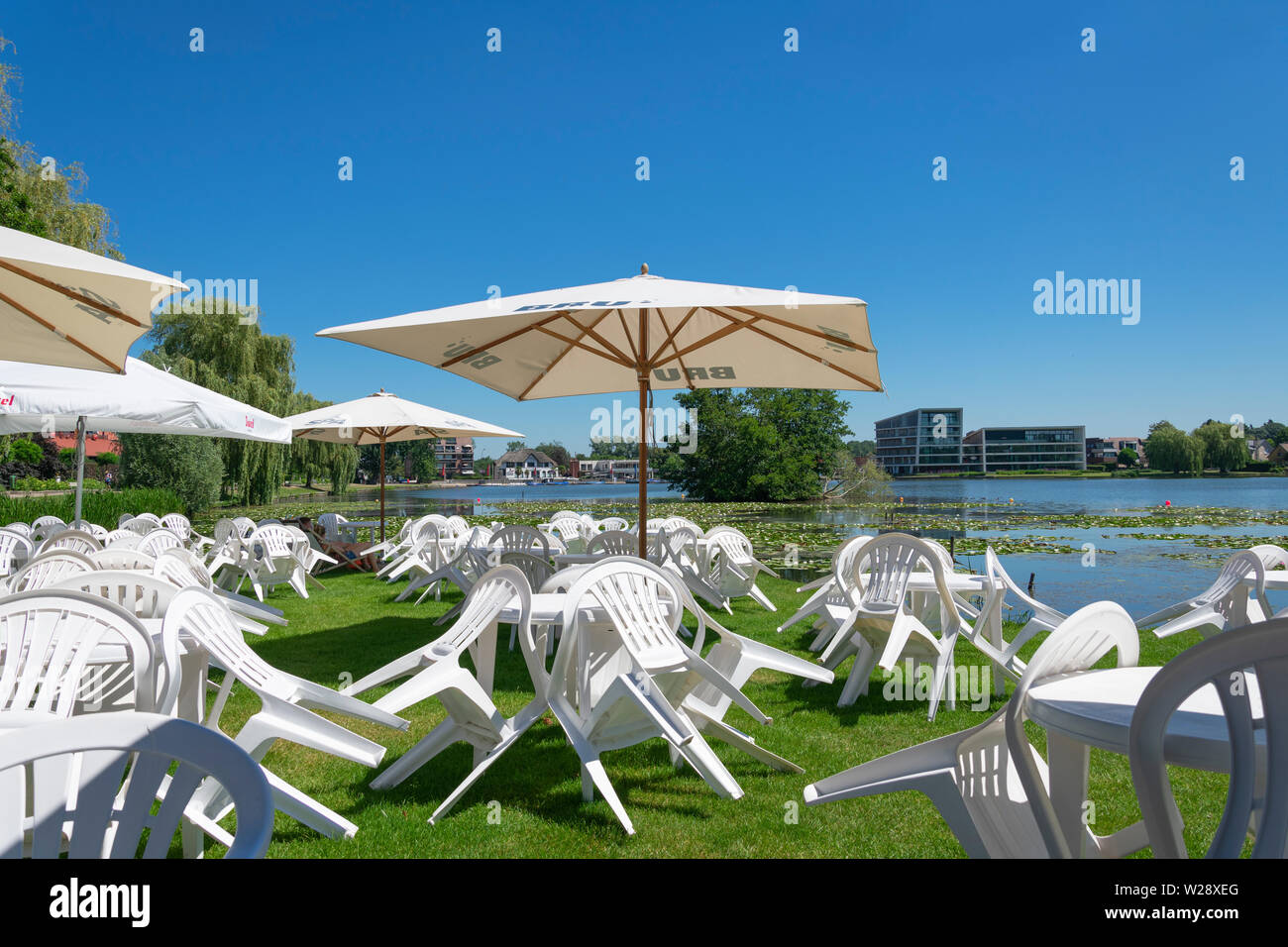 Berlare, Belgium, 29 June 2019, couple sits alone on an empty terrace ...