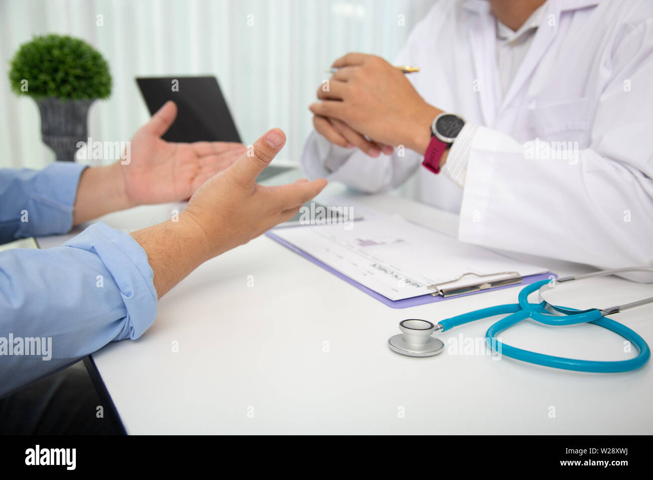 patient is telling the illness to the doctor to listen to the correct ...