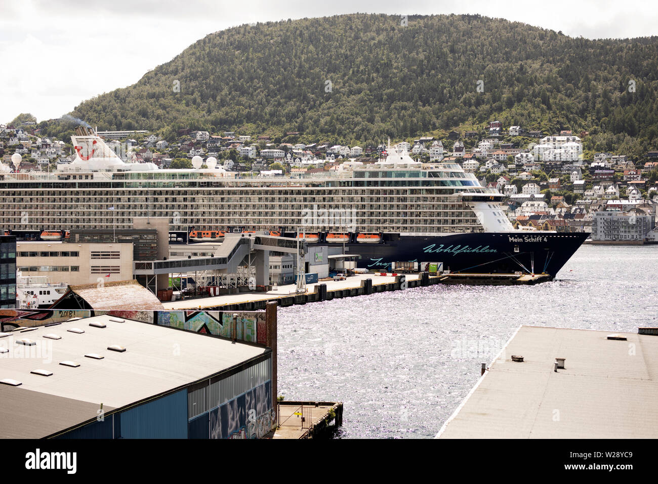 A German Mein Schiff cruise ship docked in the harbor in Bergen, Norway ...