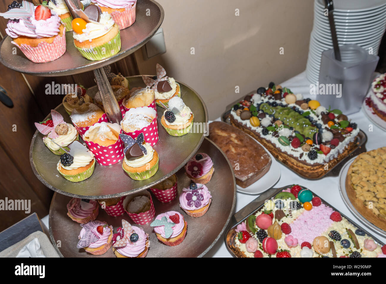 Dessert buffet with various muffins, cakes and pastries Stock Photo - Alamy