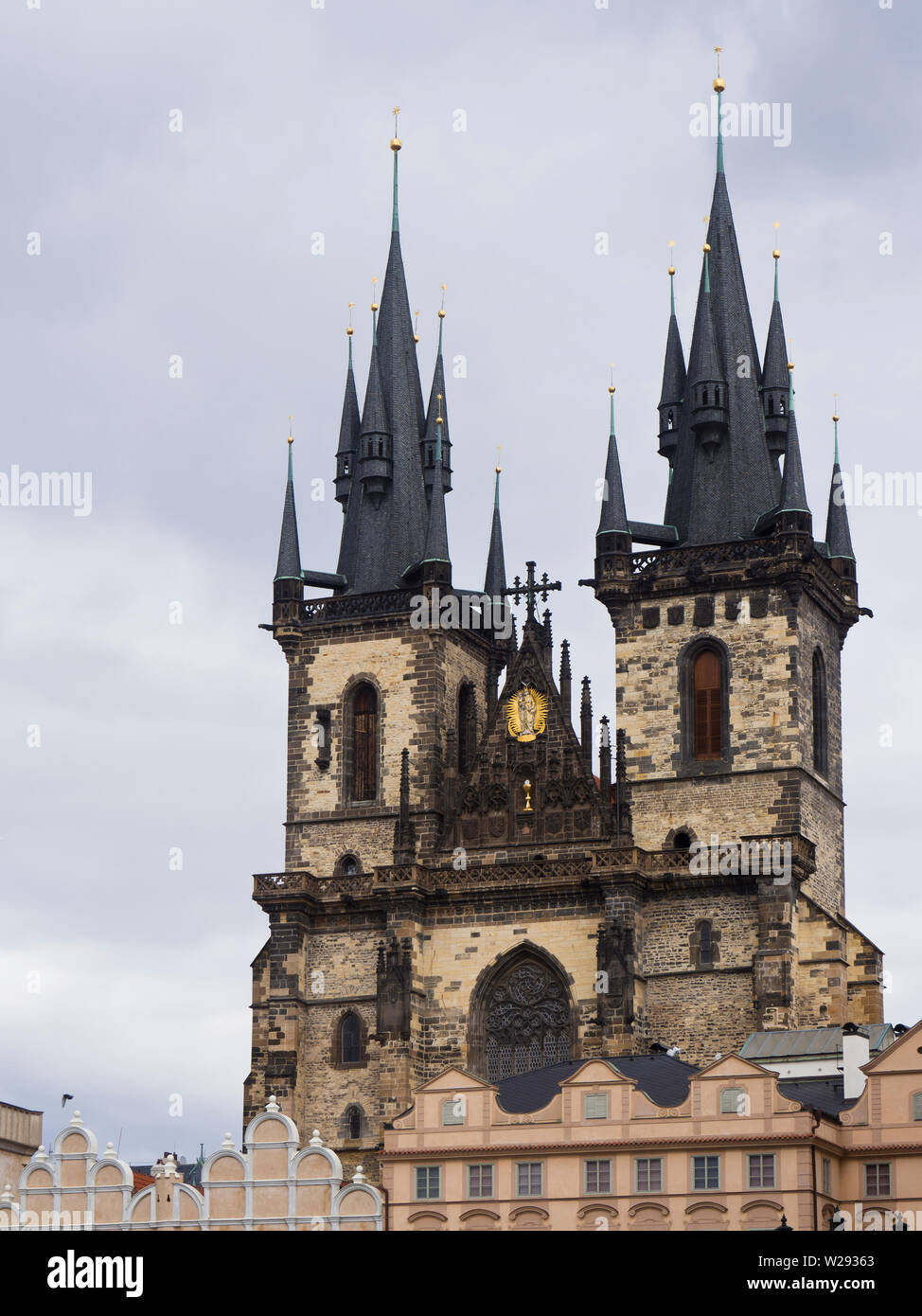 The two tall spires of the Church of Our Lady before Týn towering over ...