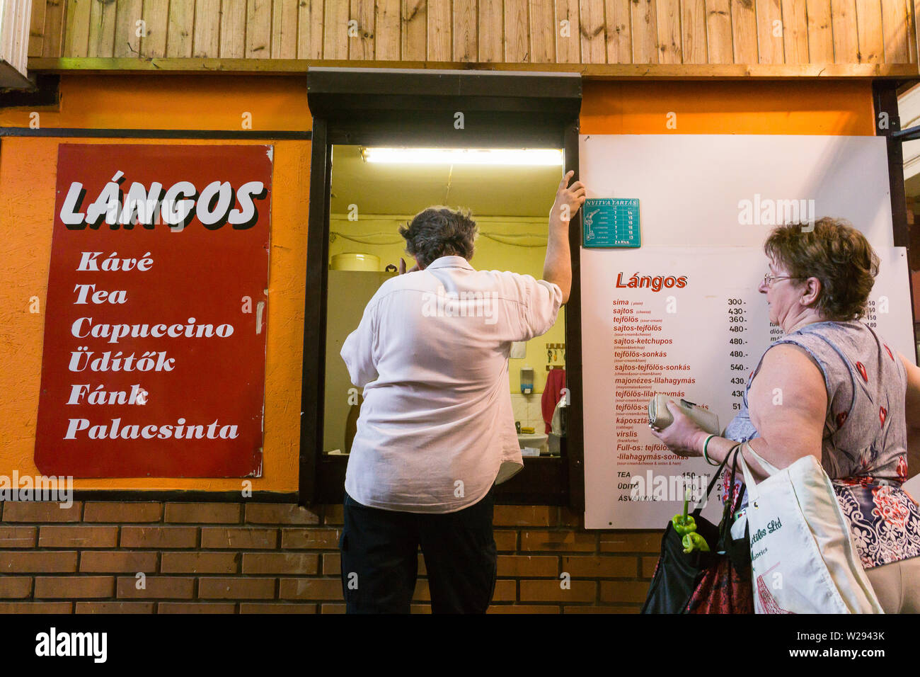 Budapest langos stand - Locals buying langos at at Rakoczi ter market ...