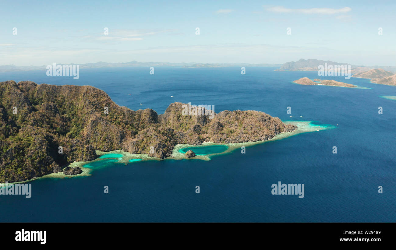 aerial view tropical islands with blue lagoons, coral reef and sandy ...