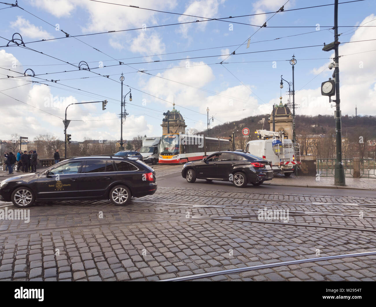 Busy traffic in Prague, Czech Republic, tram lines and cars in an ...