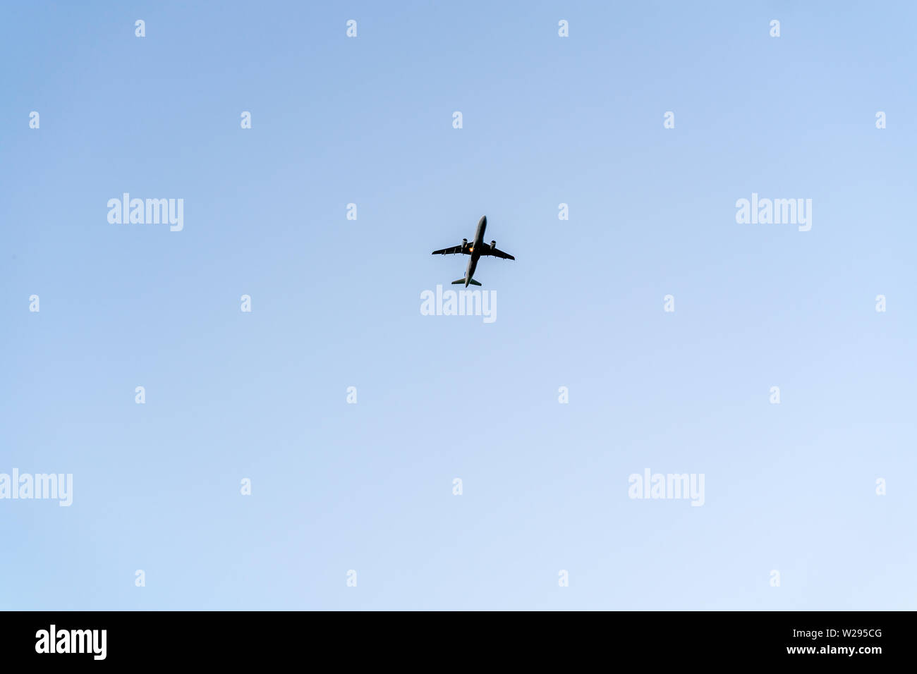 departure of an airplane with bottom view Stock Photo - Alamy