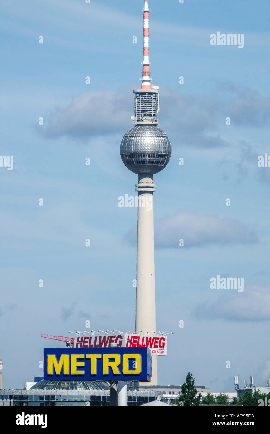 Metro logo below TV Tower Berlin Germany Europe Stock Photo - Alamy