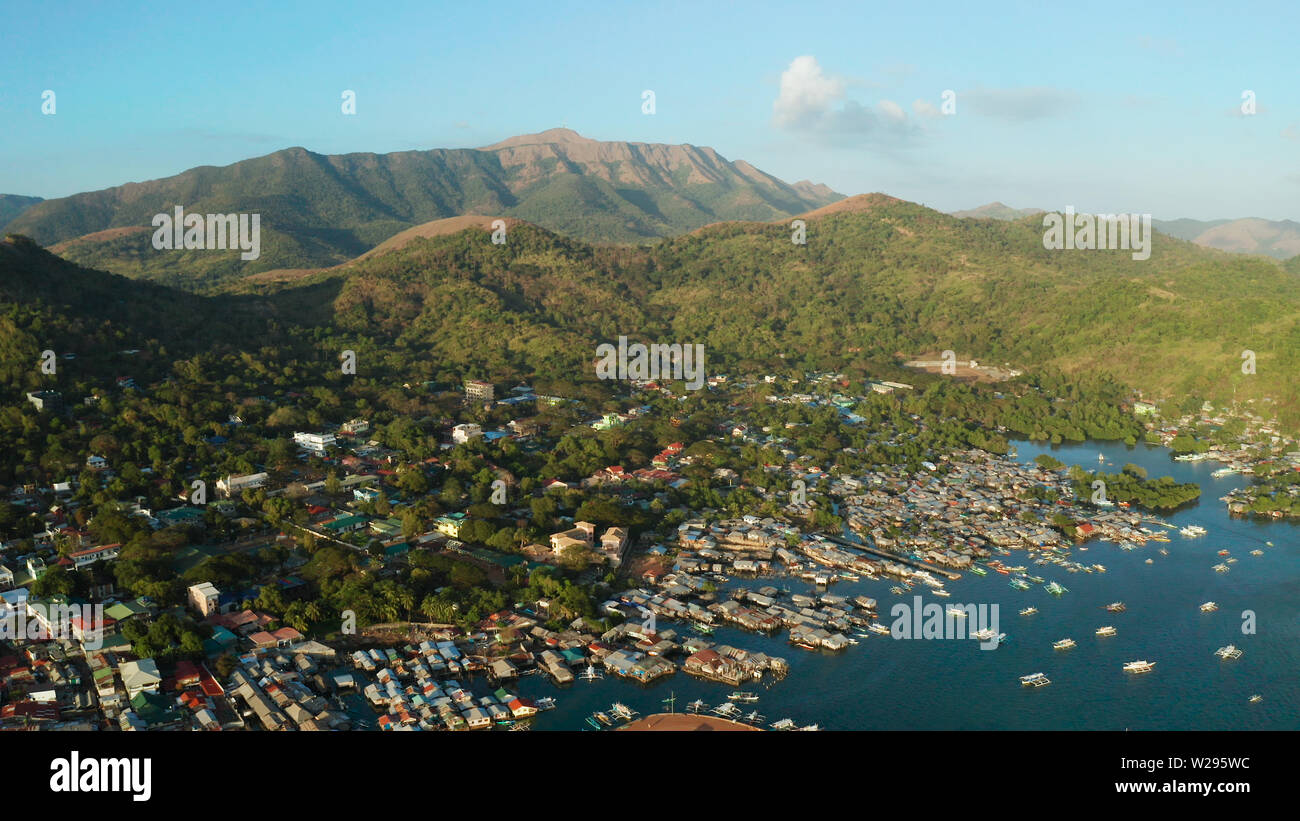 sea port, pier, cityscape Coron town with boats on Busuanga island ...