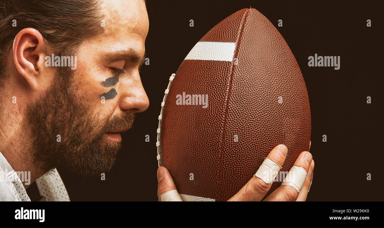 Closeup portrait of an american football player aggressive player who ...