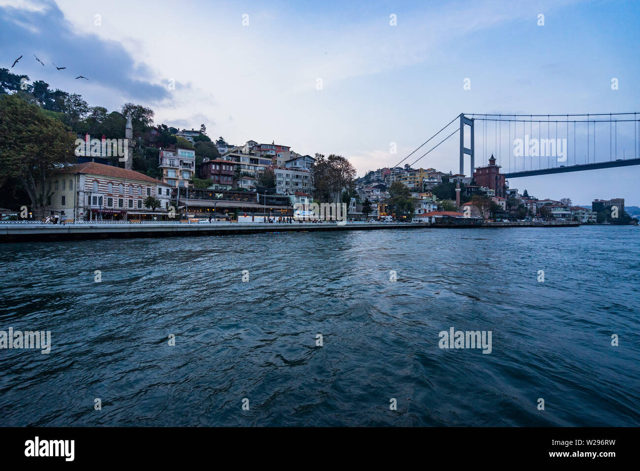 Istanbul cityscape from a ferry boat sailing the Bosphorus strait ...