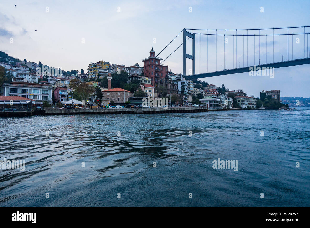 Istanbul cityscape from a ferry boat sailing the Bosphorus strait ...