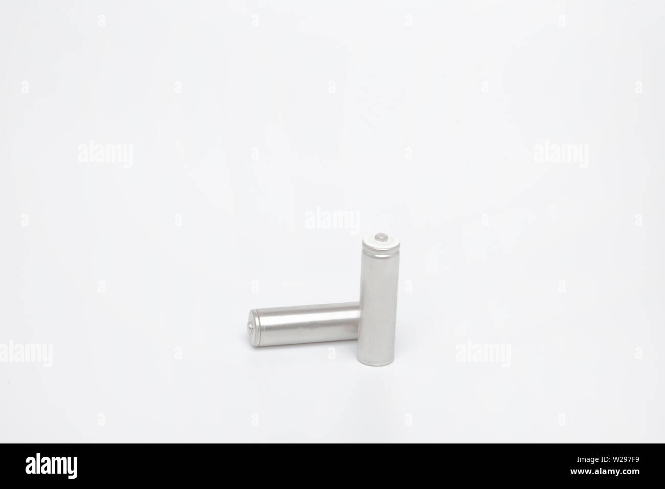 Close up grey AA batteries over white background with clipping path ...