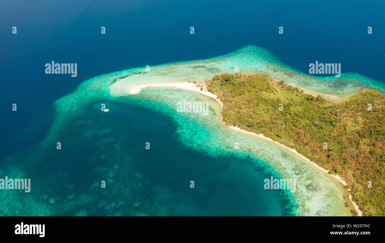 aerial seascape tropical island with sand bar, turquoise water and ...