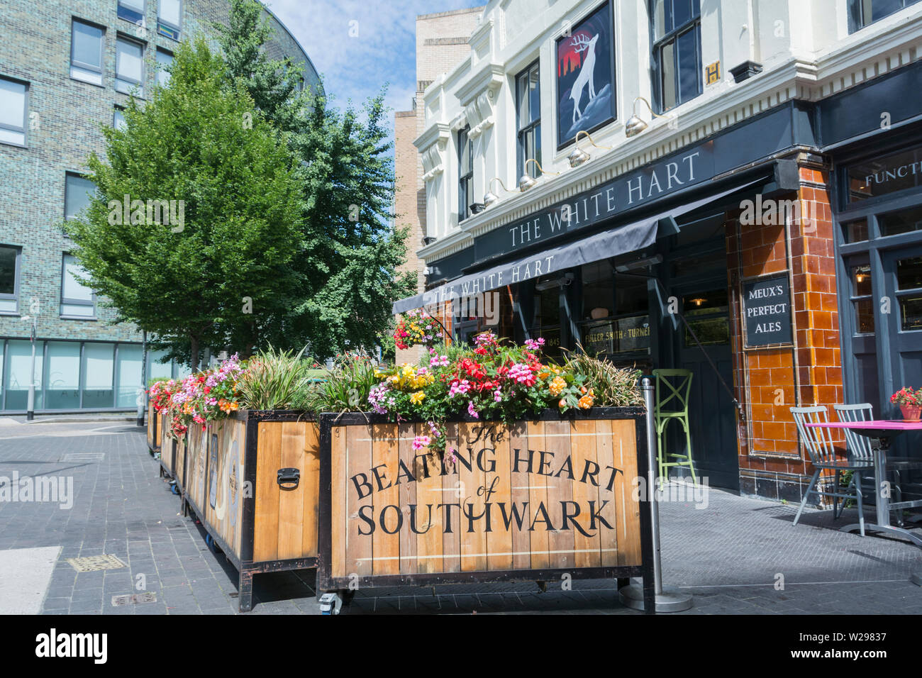 Floral troughs outside the White Hart Pub and Restaurant on Great ...